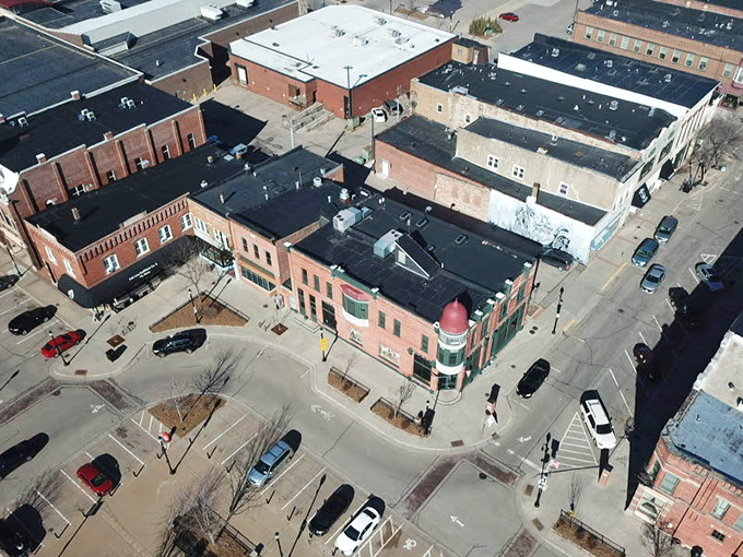 From above, Graffiti's corner location in downtown Stevens Point reveals itself as the perfect urban oasis—close enough to everything yet somehow feeling like your own discovery.