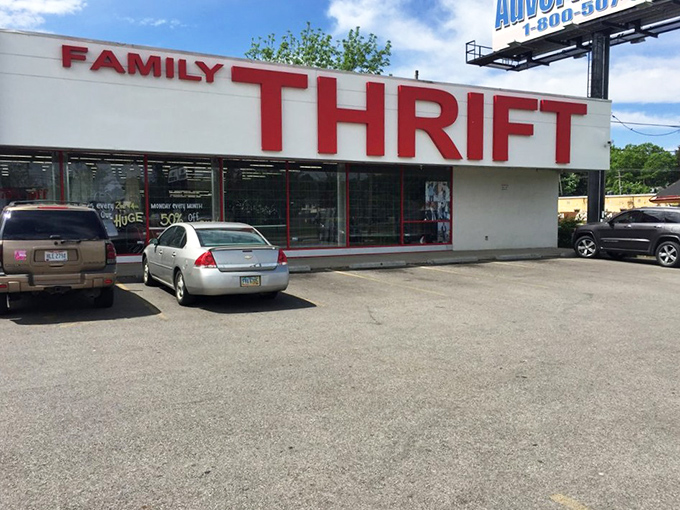 The exterior view &ndash; where cars gather like hungry diners outside a famous barbecue joint. The red signage promises treasures within for the savvy shopper.