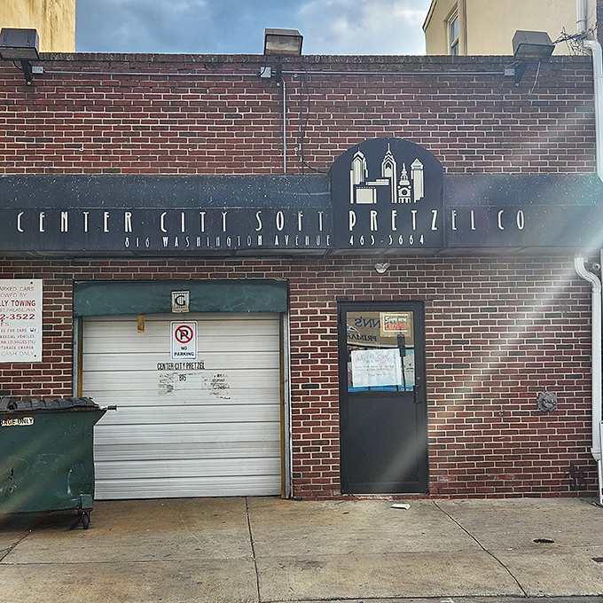 The Washington Avenue storefront stands like a carb-loaded lighthouse, guiding hungry souls to safety with its blue awning and brick facade. 