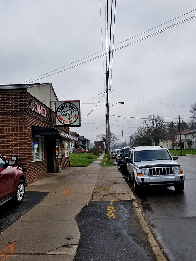 From the street, it looks unassuming, but locals know better—this corner brick building houses burger magic that keeps Massillon coming back for more.