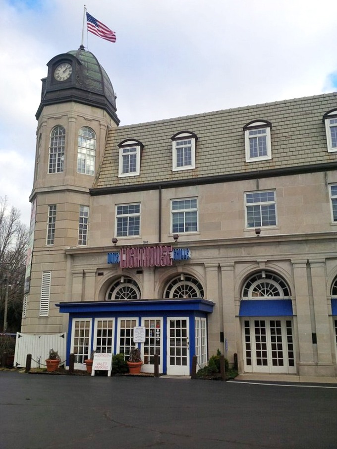 The American flag stands proud atop this lighthouse-inspired landmark, where Cleveland's culinary beacon has guided hungry souls to exceptional seafood for generations.