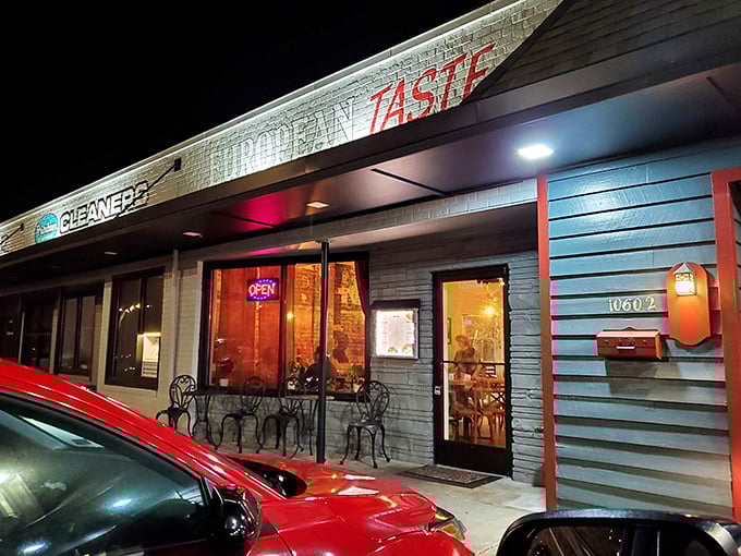 European Taste after dark, glowing like a beacon for those seeking authentic Romanian flavors in suburban Richmond. The night makes it even more inviting.