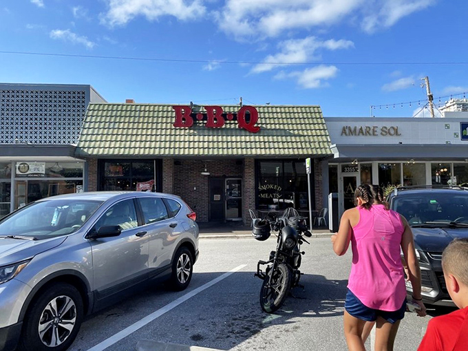 Weekend warriors and families converge where that motorcycle parks &ndash; universal sign of a legit BBQ joint.