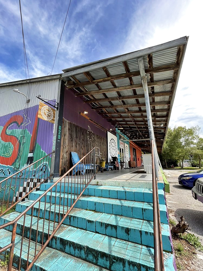 Approaching the multi-colored exterior feels like discovering a secret clubhouse for treasure hunters&mdash;complete with turquoise steps and rustic charm.