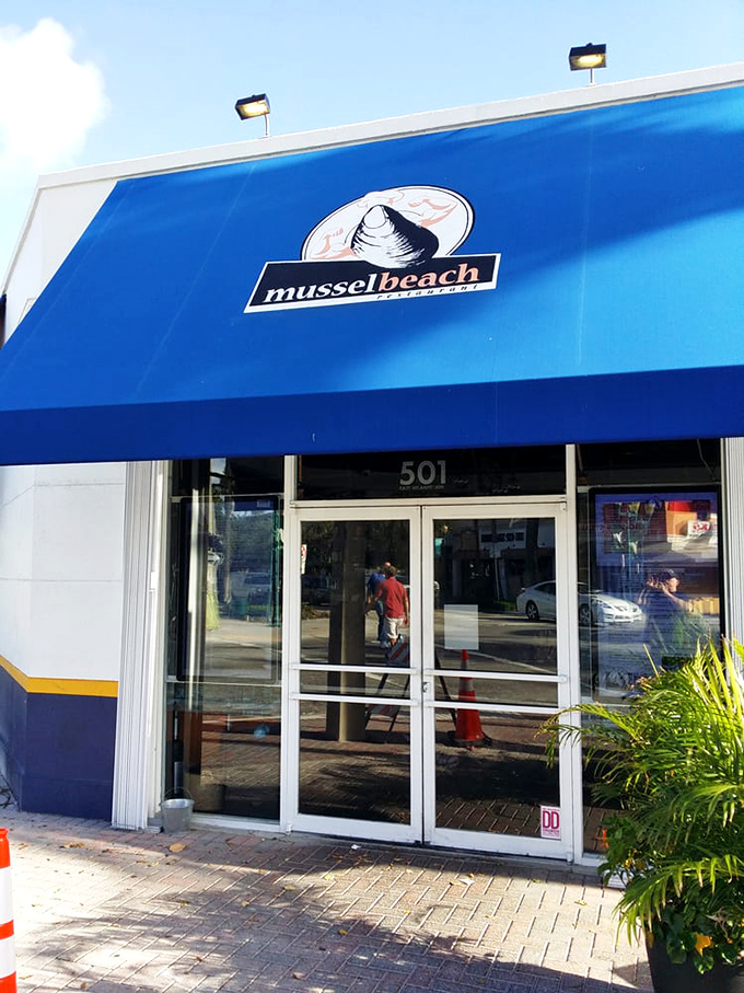 The entrance says it all &ndash; this isn't just a restaurant, it's a destination. That blue awning is basically Florida's seafood bat signal.