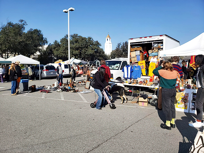 The iconic clock tower watches over shoppers as they browse outdoor stalls. Dogs welcome&mdash;they have excellent taste in vintage finds too!