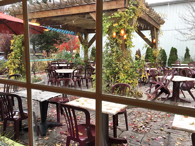 The courtyard patio offers al fresco dining under wooden pergolas, where autumn leaves add nature's confetti to your breakfast experience.