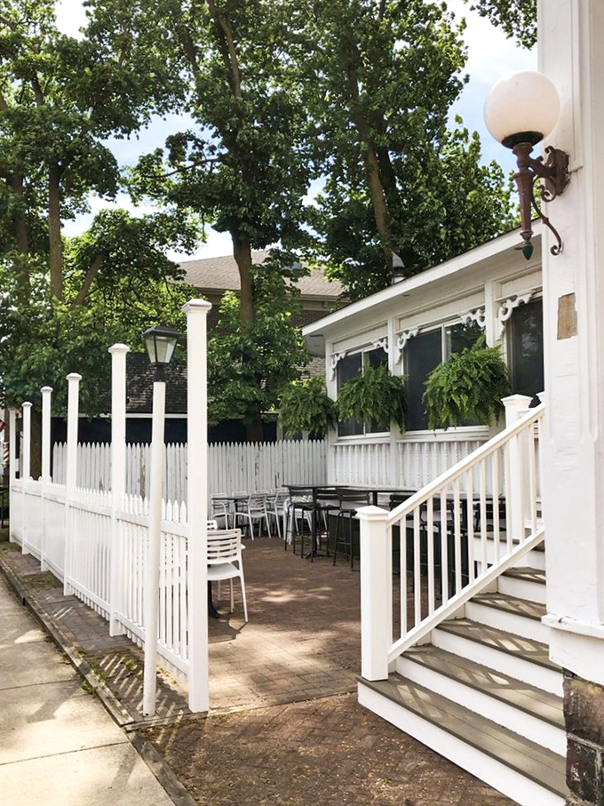 The outdoor seating area whispers promises of summer evenings with cold drinks and warm conversations. Michigan's brief patio season at its finest. 