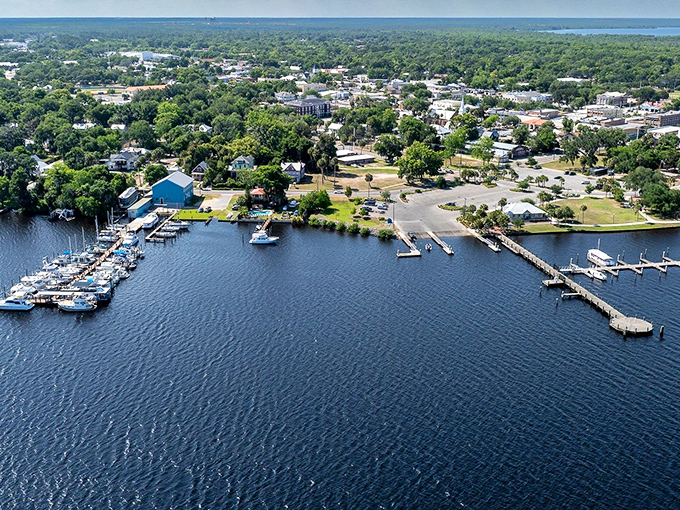 From above, Palatka reveals its perfect positioning along the St. Johns River, where boats bob peacefully and retirement dreams don't require a second mortgage.