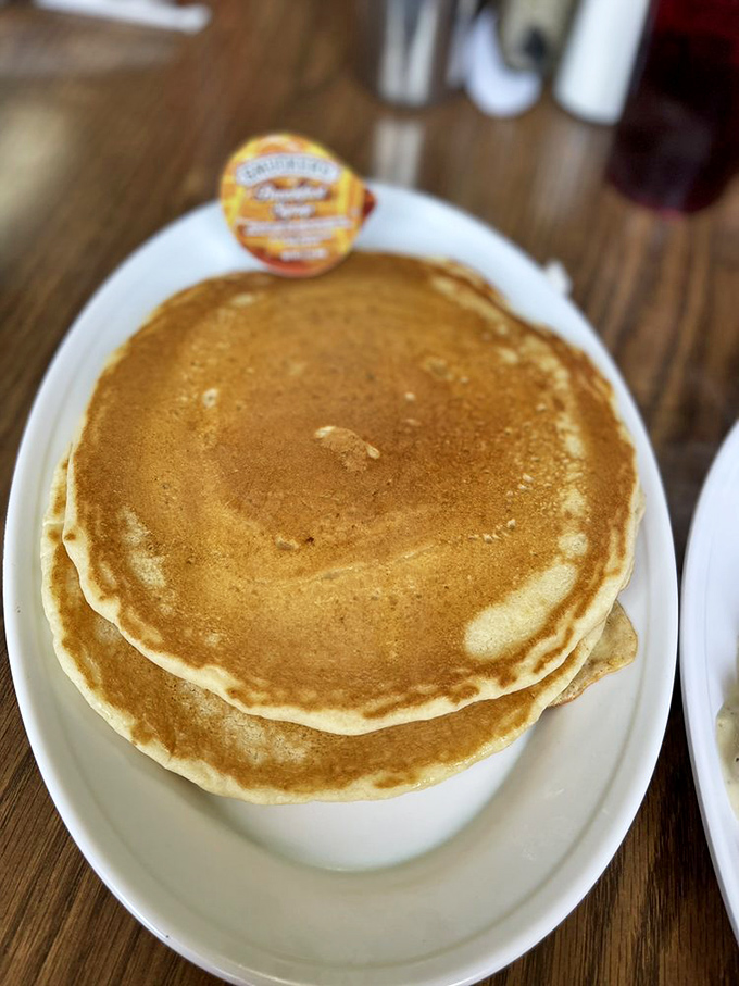 Pancakes stacked high enough to impress even the most jaded breakfast connoisseur. The perfect canvas for rivers of maple syrup and melting butter.