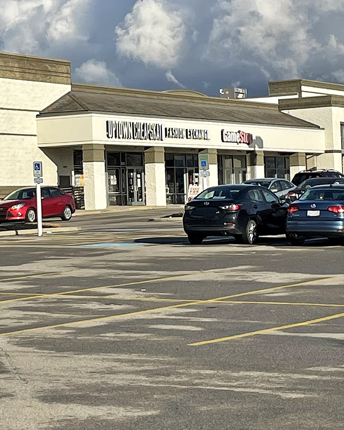 The parking lot—first hurdle in your quest for secondhand gold. Each empty space a promise of treasures waiting just beyond those doors.