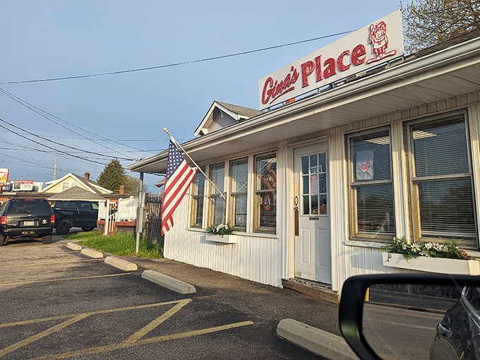 Morning light bathes Gina's Place in a golden glow, as if the breakfast gods themselves are shining approval on this temple of toast and eggs.