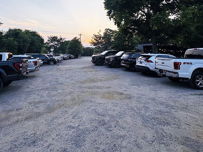A packed parking lot at sunset tells the real story—when locals fill a restaurant's spaces this consistently, you know you've found something special.