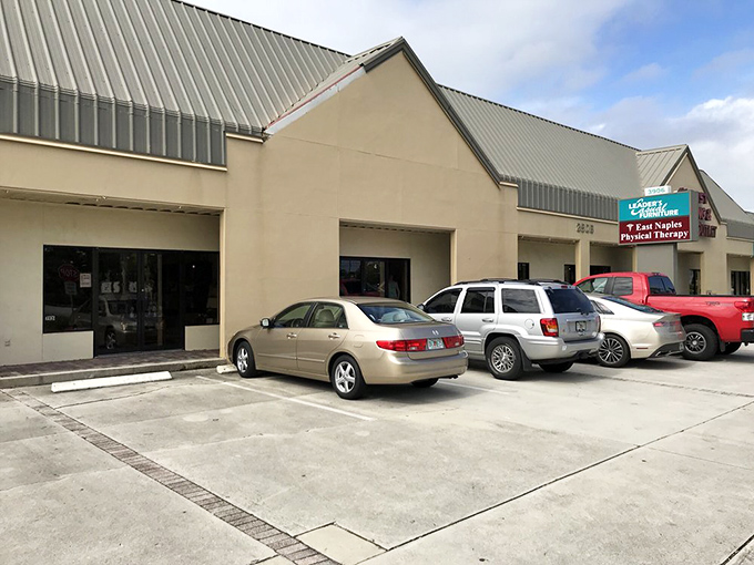 The practical parking area offers no hint of the extraordinary bargain hunting that awaits just steps away&mdash;Naples' best-kept secret hiding in plain sight.