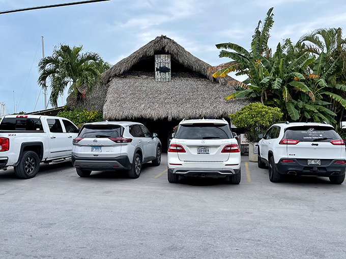 The parking lot tells the story&mdash;a mix of luxury SUVs and work trucks all drawn to the same thatched-roof temple of fresh Florida seafood.