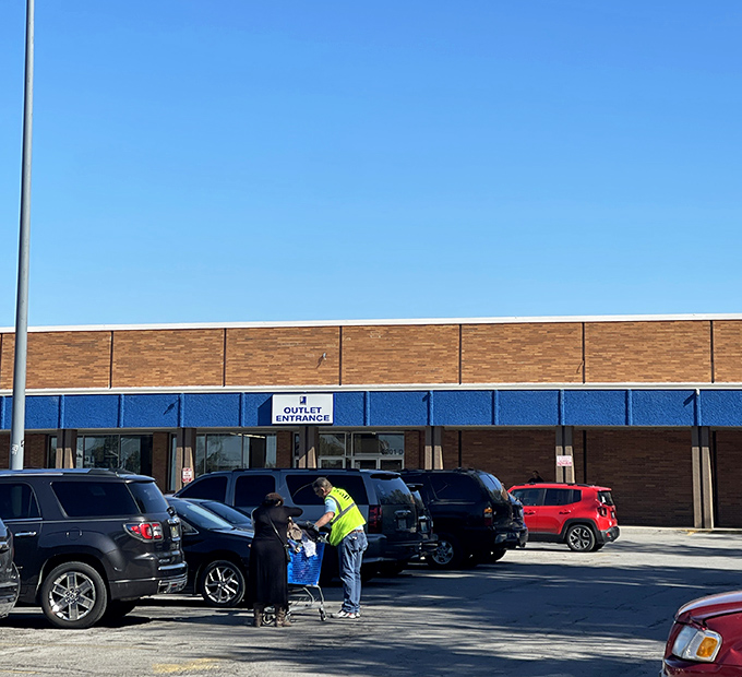 Shoppers loading treasures into waiting cars&mdash;the final act in the thrifting performance where victory is measured in trunk space.