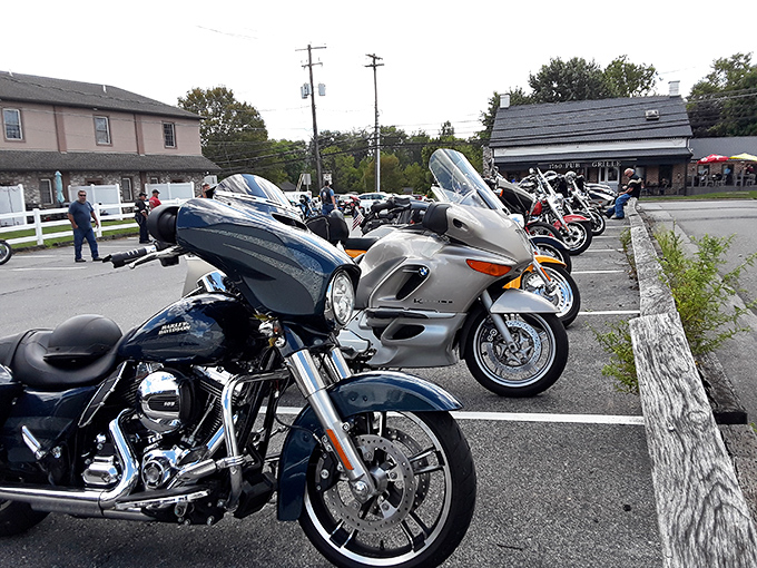The parking area often welcomes motorcycle enthusiasts, proving that good food attracts interesting people from all walks of life.