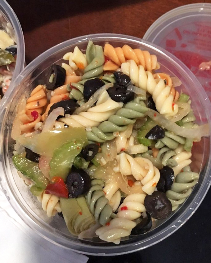 Tri-color pasta salad that puts your desk lunch to shame. Those olives aren't just ingredients; they're little flavor bombs waiting to detonate.