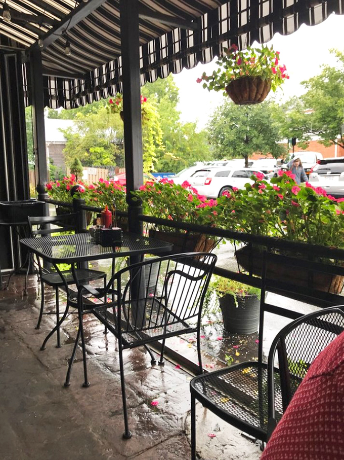 Even the patio invites lingering, with hanging baskets of flowers providing a colorful backdrop to your coffee and conversation. Ohio charm personified.