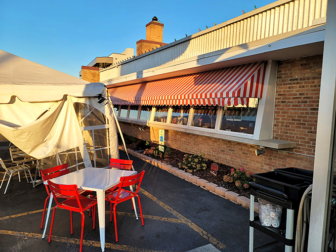 Even the outdoor seating has that classic Route 66 charm. The red chairs pop against the brick building like cherries on a sundae.