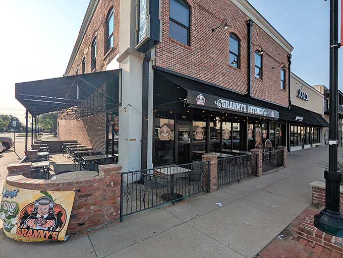 The sidewalk patio offers front-row seats to Main Street life—perfect for people-watching while your biscuits soak up that legendary gravy.