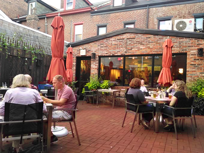 Those coral umbrellas don't just provide shade&mdash;they create little islands of culinary happiness in Tessaro's charming brick courtyard.