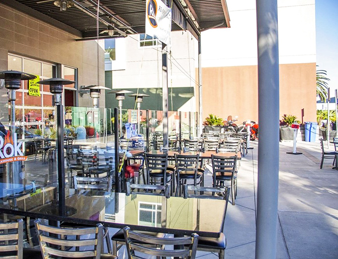 Patio seating that lets you enjoy California's perfect weather while deciding which premium cut deserves the hot rock treatment.