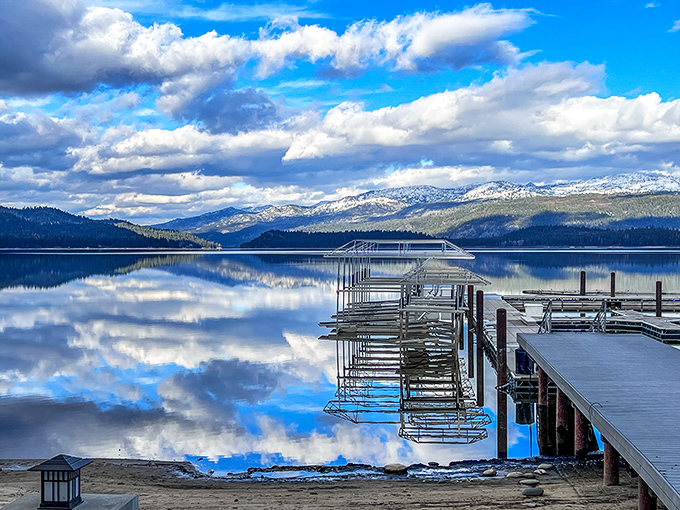 Winter's first dusting meets Payette Lake's mirror-like surface. Cloud reflections create a double-feature of Idaho sky that no theater could match.