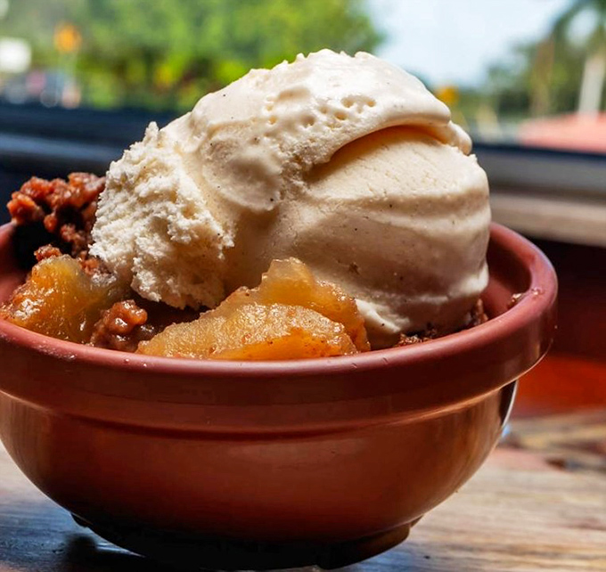 Warm peach cobbler provides the sweet finale that every great barbecue meal deserves and craves.
