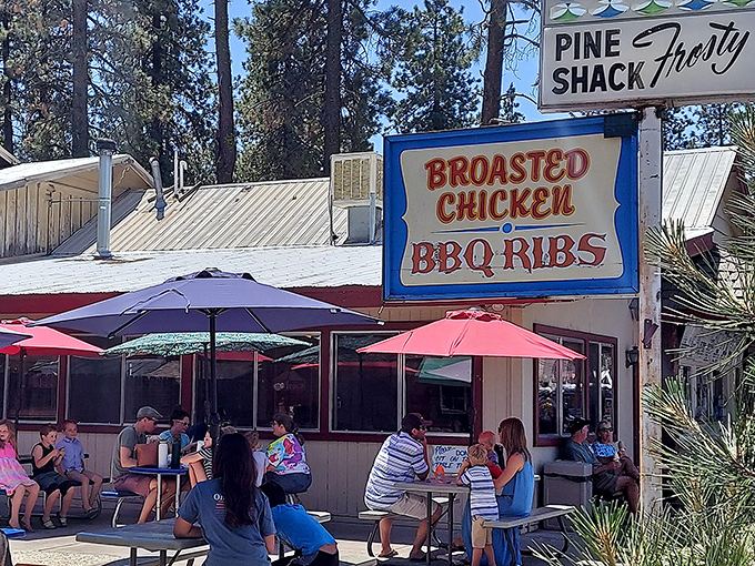 Pine Shack Frosty draws crowds with the magnetic pull that only perfectly executed comfort food under outdoor umbrellas can achieve.