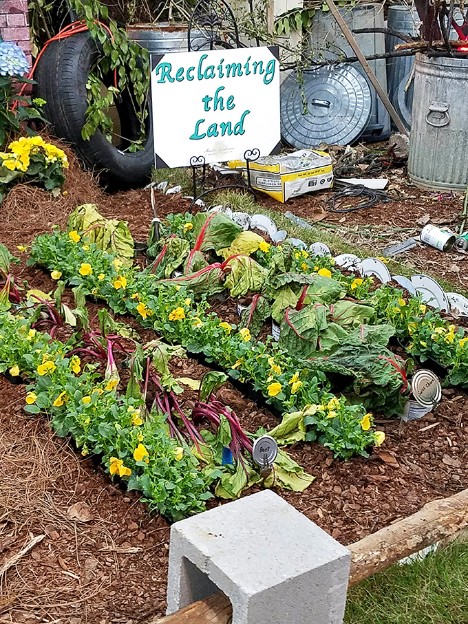 "Reclaiming the Land" demonstrates how yesterday's trash transforms into tomorrow's garden – recycling with a green thumb and creative spirit.