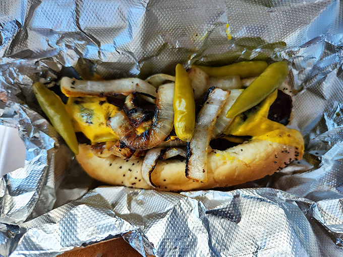 The Polish sausage with grilled onions and sport peppers—proof that sometimes the simplest combinations create the most profound happiness.