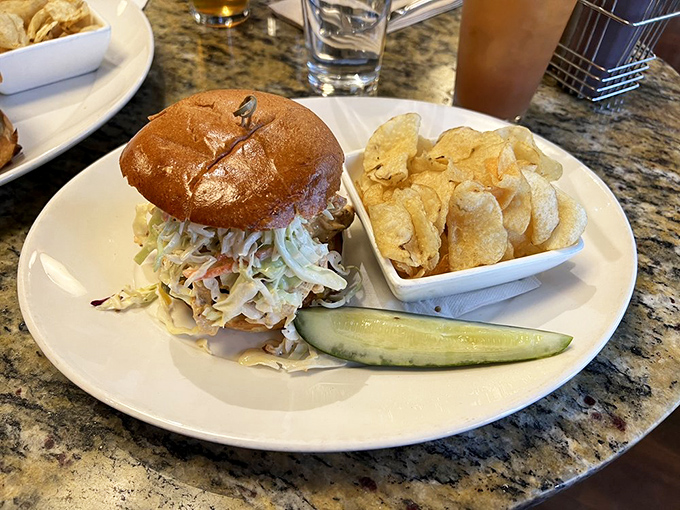 The pulled chicken sandwich arrives with perfect proportions of meat, slaw, and bun&mdash;a harmonious trio that sings in perfect barbecue harmony.