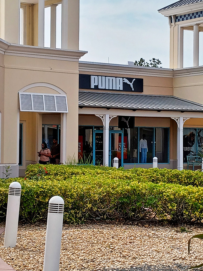 PUMA prowls behind manicured hedges, ready to pounce with athletic wear deals that make even window shopping a competitive sport.