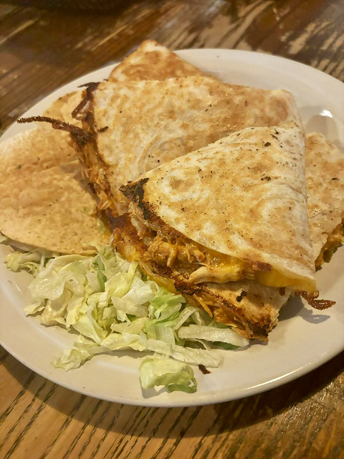 This quesadilla isn't messing around&mdash;packed with melty cheese and served with fresh lettuce, it's the handheld happiness we all deserve.