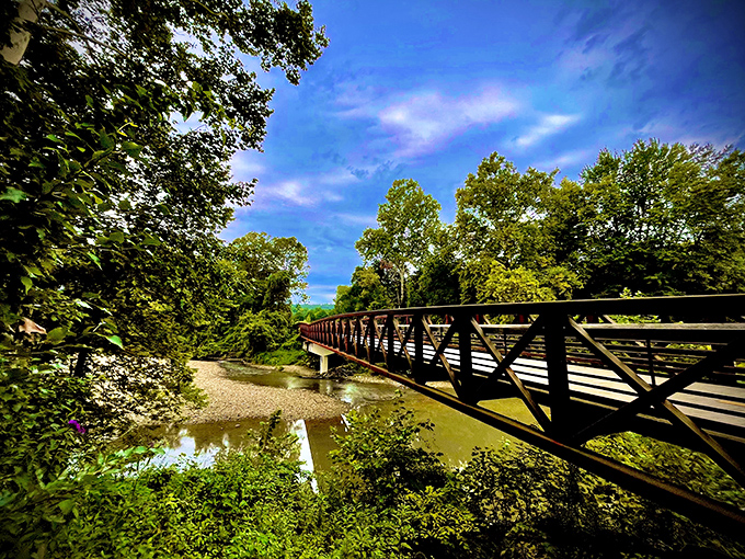 This footbridge doesn't just connect two sides of a creek&mdash;it connects visitors to Granville's natural beauty. Engineering meets enchantment.