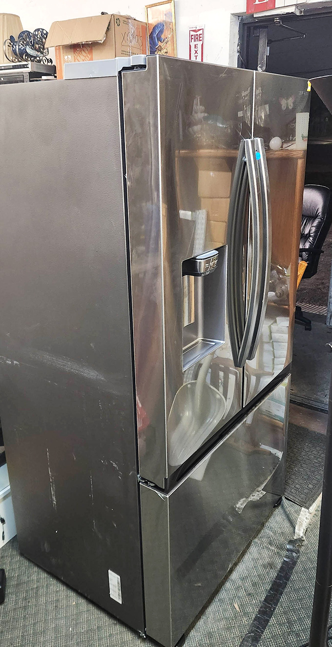 Stainless steel refrigerator stands tall, promising to keep your leftovers as cool as these prices.