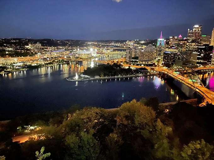 Pittsburgh's skyline at night from Le Mont's vantage point &ndash; three rivers of light flowing between buildings. Worth every penny.