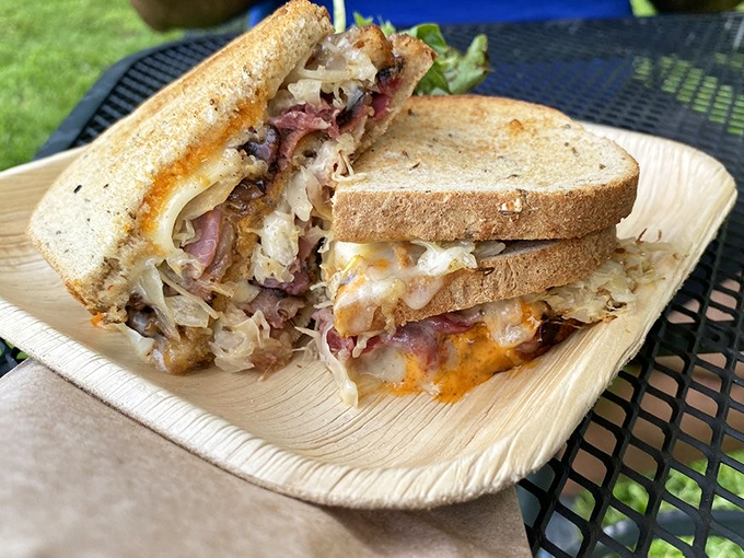 Behold the Reuben in its natural habitat&mdash;layers of pastrami, sauerkraut, and melted cheese creating the perfect symphony of savory satisfaction.