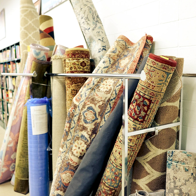 A textile lover's dream&mdash;rolled area rugs in intricate patterns await the perfect space, proving luxury floor coverings don't require luxury budgets.