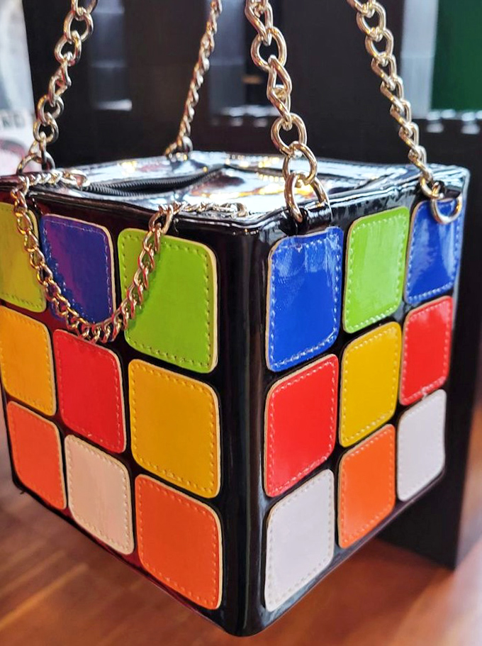 Not just a purse&mdash;a wearable conversation piece. This Rubik's Cube handbag solves the puzzle of how to make strangers smile on public transportation.