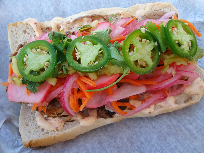A sandwich that's practically a garden on bread&mdash;where pickled vegetables and jalape&ntilde;os bring bright crunch to balance the smoky meat beneath.