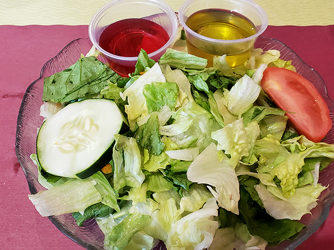 Even the side salad gets respect here &ndash; fresh, crisp, and colorful, proving that Jack's excellence extends beyond their meat and bread masterpieces.