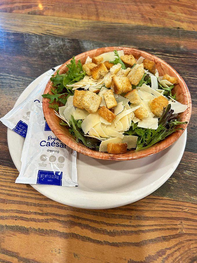 A simple Caesar salad that proves even the classics get special treatment here. Those house-made croutons deserve their own fan club.