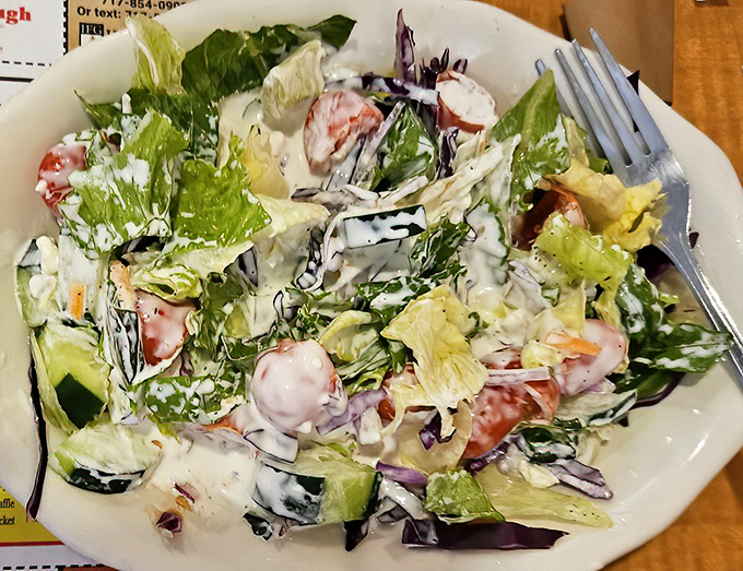 A salad so fresh and creamy it almost makes you forget you came for the pancakes. Almost.