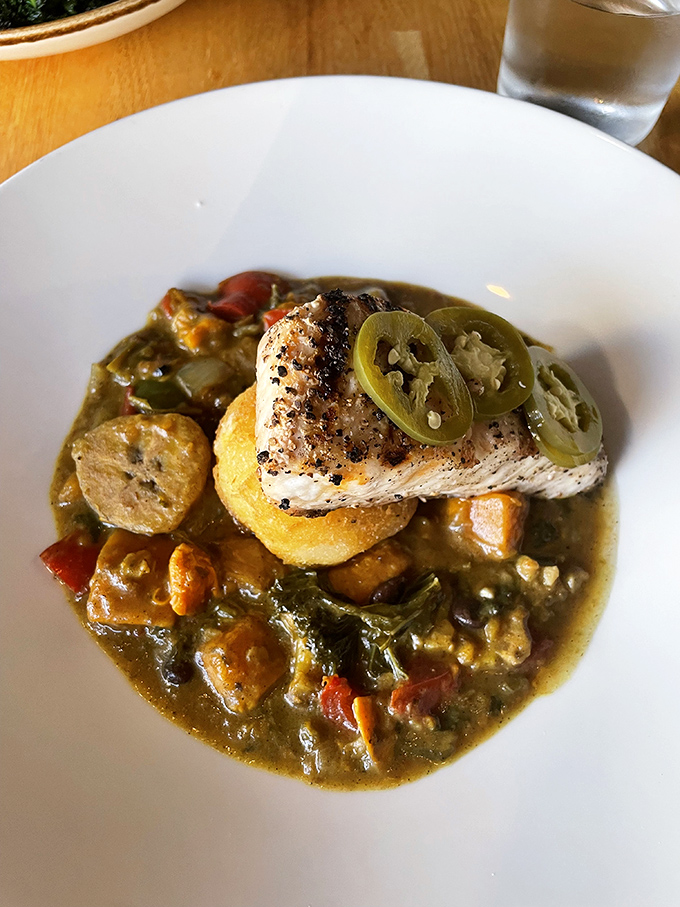 This seabass dish is a study in textures&mdash;crispy skin, tender flesh, and a broth that begs to be sopped up with anything within reach.