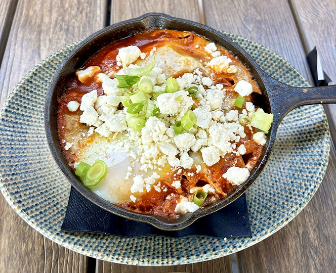 A skillet of shakshuka that could wake up even the most stubborn morning grump. The feta cheese melting into that spiced tomato sauce is pure breakfast poetry.