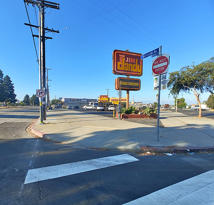 The iconic Jim Dandy sign stands tall against the California sky, a landmark for those seeking authentic Southern comfort.