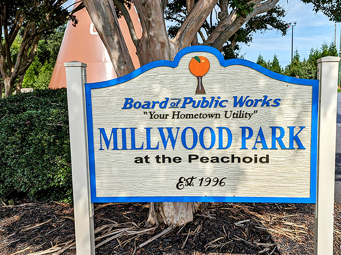 Millwood Park at the Peachoid welcomes visitors with small-town charm, inviting travelers to linger in the shadow of fruity greatness.