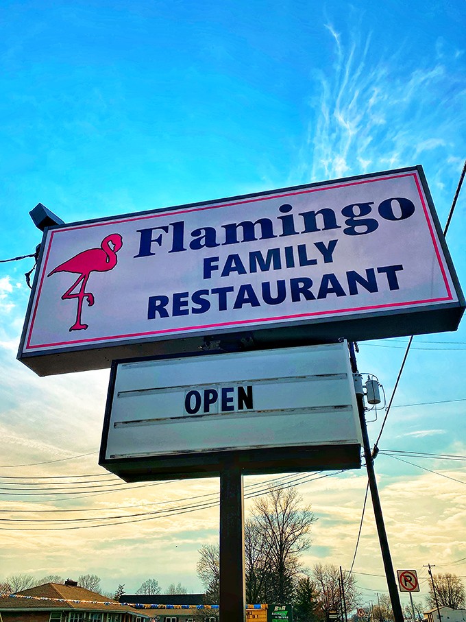 The sign that beckons hungry travelers like a lighthouse for the breakfast-starved. That flamingo knows what you need.
